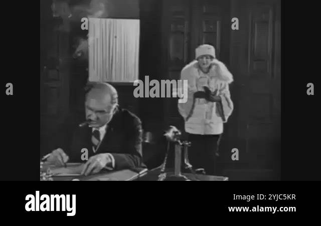 US - 1924 - in this silent comedy, a daughter enters her father's office and replaces his cigar ...