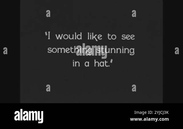 US - 1928 - in this silent comedy, a customer tries on a hat in a store ...