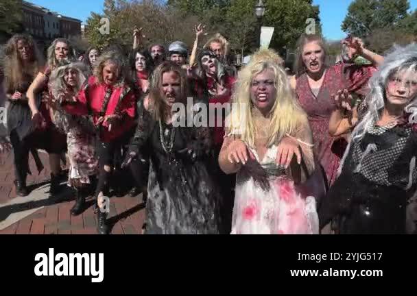Suwanee, GA / USA October 12, 2024: Handheld shot shows a group of ...