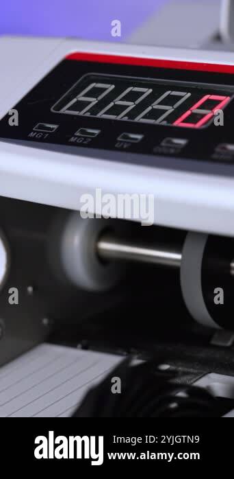 Electronic cash money counter. Counter machine is processing american ...