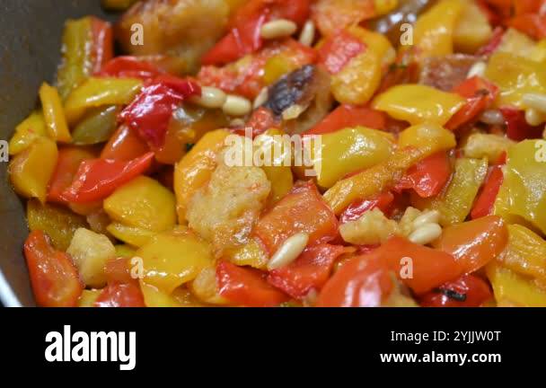 The peppers are cooked in a pan and flavoured with a dressing made from ...