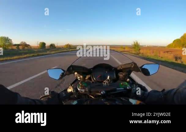 The viewpoint of motorcyclist driving motorbike at speed highway. Point ...