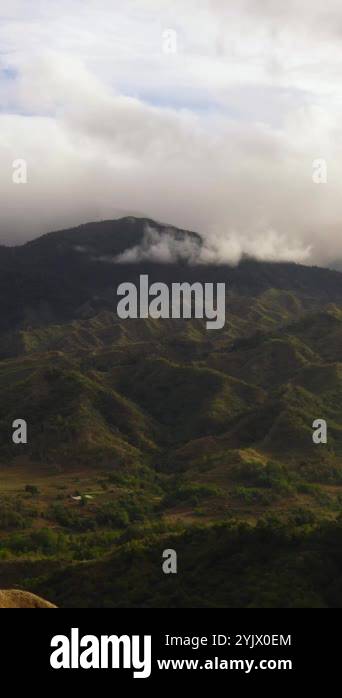 Tropical mountain range and mountain slopes with rainforest ...
