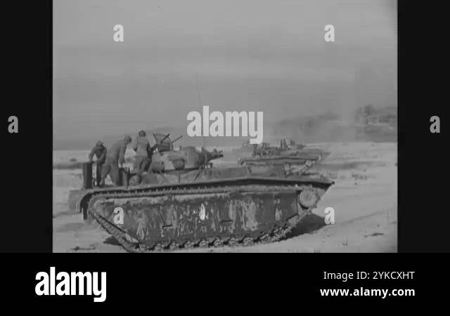 KOREA - 1950 - UN troops look towards distance, fire guns, and head ...