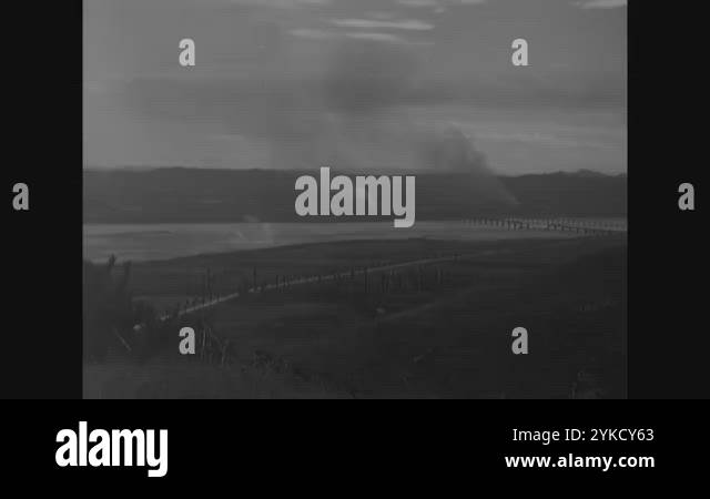 SOUTH KOREA - 1950 - A South Korean soldier uses a pickaxe to dig on a ...