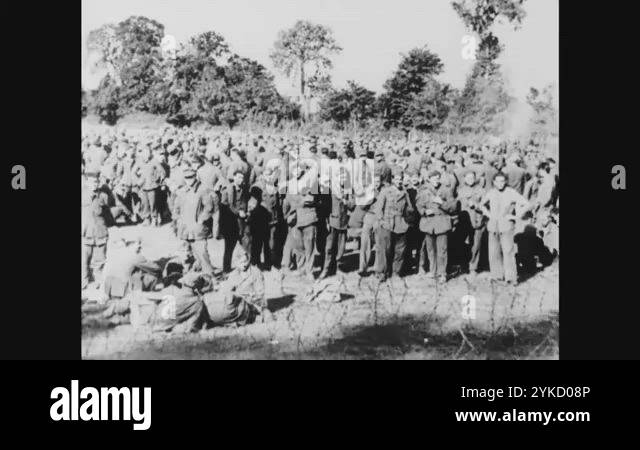 NORMANDY - 1944 - Nazi POWs are questioned, fed, and treated for their ...