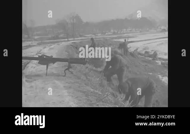 KOREA - 1951 - US soldiers dig holes and carry frames for the rifle ...