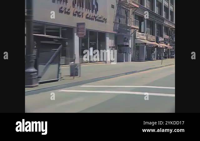 LOS ANGELES - 1950s - View from a car driving down a busy street in Los ...