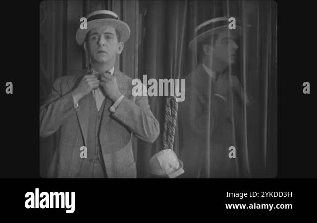 US - 1928 - in this silent comedy, a man gets dust in one eye and tries ...