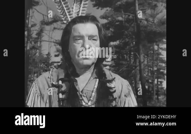 US - 1957 - in this western, a woman reacts with abject fear when she ...