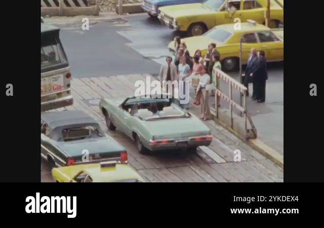 USA - 1960s - Color footage tests of pedestrians crossing a busy city ...
