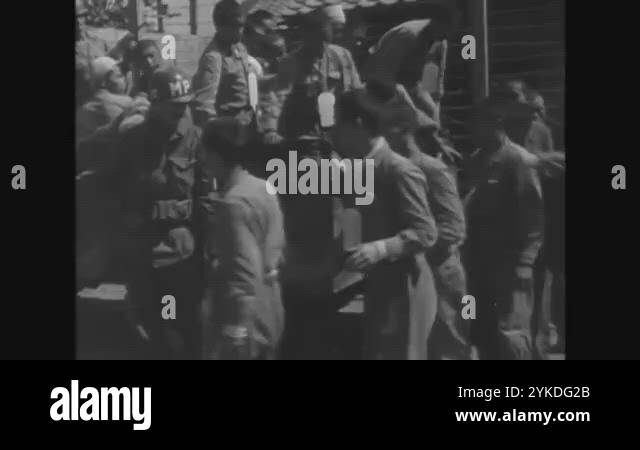 SEOUL - 1950 - Military police pat down and check the papers of North ...