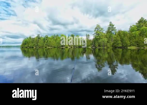 Catch and release fishing game sport of bass fish on the lake in Canada ...