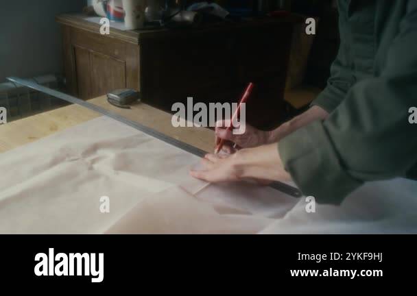 Cropped side shot of unrecognizable artisan measuring upholstery ...