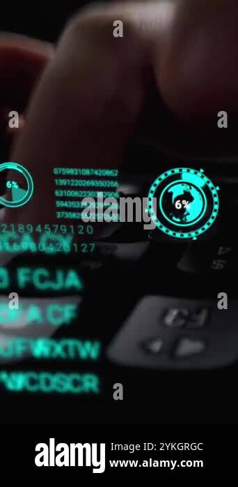 Man working on laptop computer keyboard with graphic user interface GUI ...