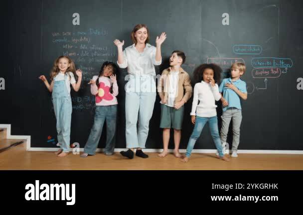 Multicultural happy student and teacher smiling and standing at ...