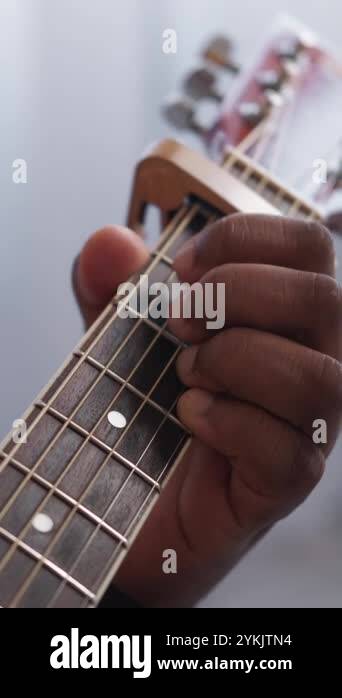 Vertical video. Guitar music. Artist playing. Chord practice. Performer ...