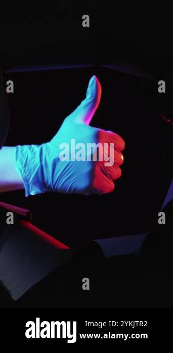 Vertical video. Medical disapproval. Lab failure. Red blue neon light ...