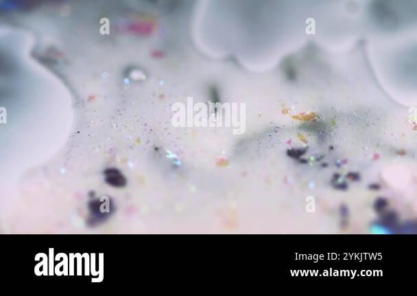 Liquid glitter spill. Shiny fluid. Blur translucent white color ...