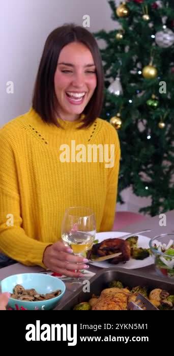 Happy multi generational family enjoying christmas dinner at home ...