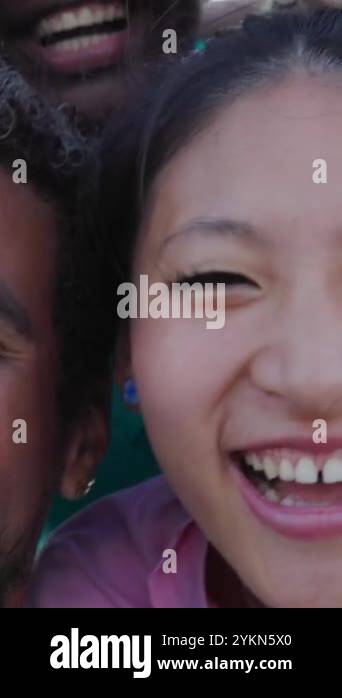 Vertical HD video. Close-up portrait of united young gen z teen ...