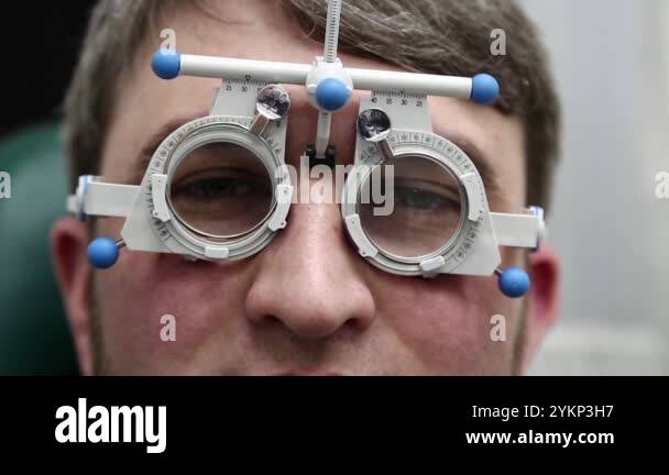 Man patient at the reception of an ophthalmologist, selection of ...