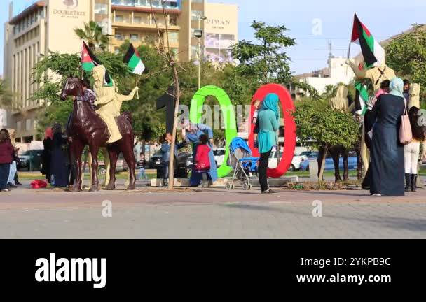 JORDAN, AQABA, DECEMBER 16, 2016: People near monument to the ...