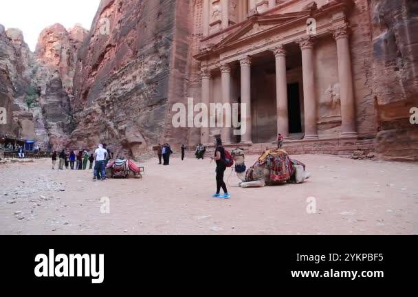 JORDAN, PETRA, DECEMBER 5, 2016: People and camels near Al Khazneh or ...