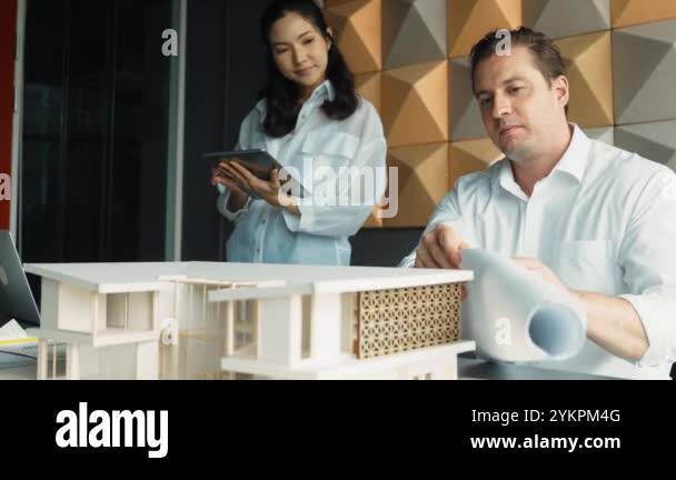 Professional architect engineer team design and discuss about house by ...