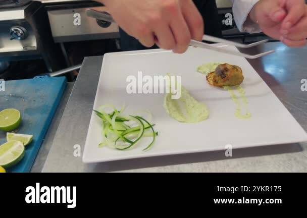 Plating Of A Raw And Cooked Fish Based Appetizer In A Luxury Italian ...