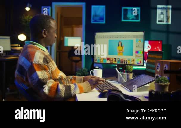 Freelance graphic designer working from home office on editing photos ...