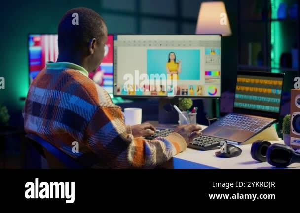 Freelance graphic designer working from home office on editing photos ...