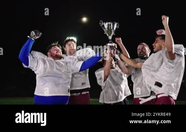 American Football Team in White Uniform in the Middle of the Field ...