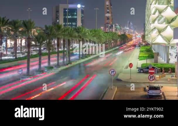 Aerial night timelapse of King Fahd Road in Riyadh, Saudi Arabia. Bustling busy traffic with ...