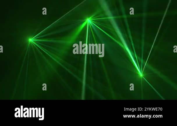 High speed laser light show on black background with flashing green ...