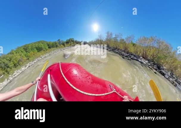 A 360-degree view of a rafting boat navigating down a river, with the ...