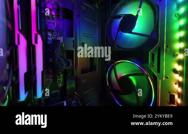 A dolly shot inside a gaming PC, moving closer to reveal vibrant RGB ...