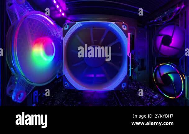 A stationary close-up view inside a gaming PC, showcasing vibrant RGB ...
