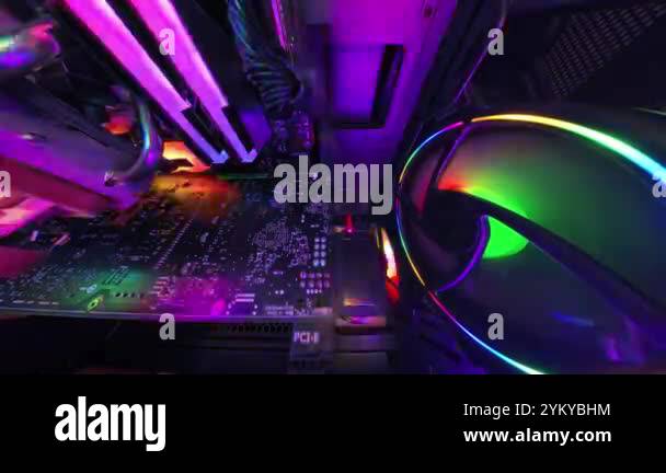A close-up view inside a gaming PC, showcasing the illuminated ...