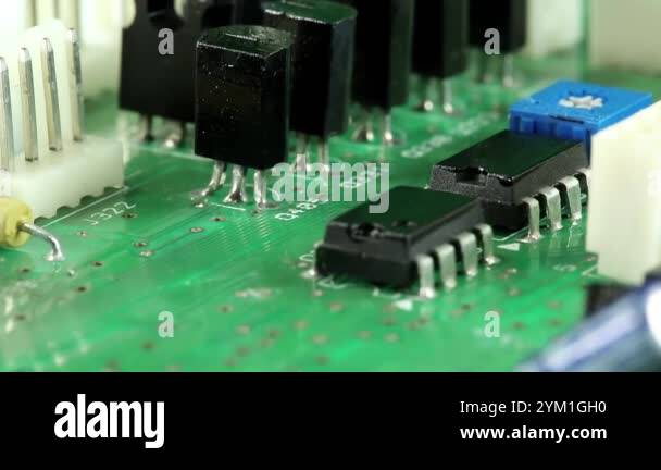 Microcircuit chip with electronic components. Close-up of micro circuit ...