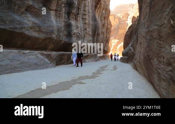 JORDAN, PETRA, DECEMBER 5, 2016: People in The Siq - narrow passage ...