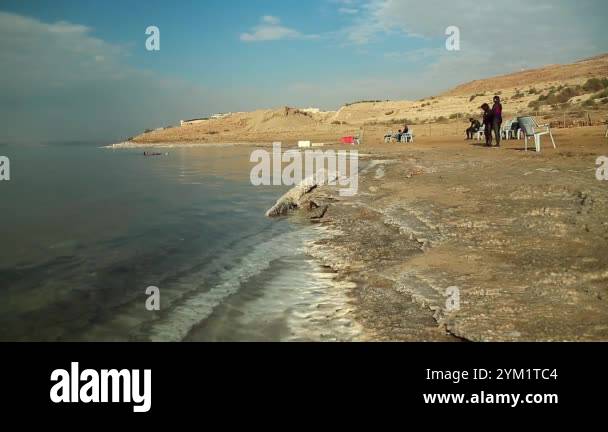 JORDAN, DEAD SEA, DECEMBER 8, 2016: People on the beach of Dead Sea ...
