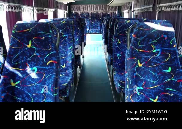 Empty interior of minibus. Bus interior with blue chair. Empty seats in ...