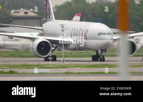 ALMATY, KAZAKHSTAN - MAY 11, 2024: Widebody Boeing 777, A7-BTA of Qatar ...