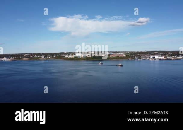 Sure Heres a rephrased version: Drone View: Two ferries cruising across ...