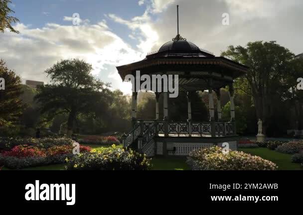 Early sunny morning in Halifax Public Gardens, with light rain creating ...
