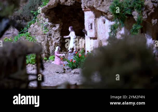 Stop motion animation depicts a woman kneeling in reverence before ...