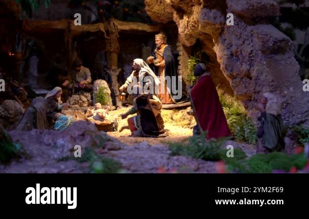 Three wise men kneel before baby jesus in a nativity scene, celebrating ...