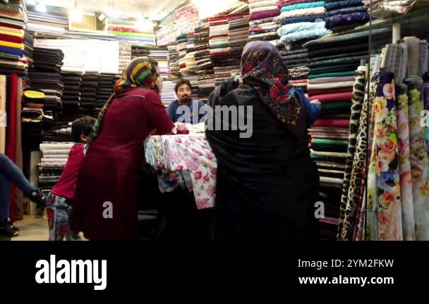 Two women selling fabric Stock Videos & Footage - HD and 4K Video Clips ...
