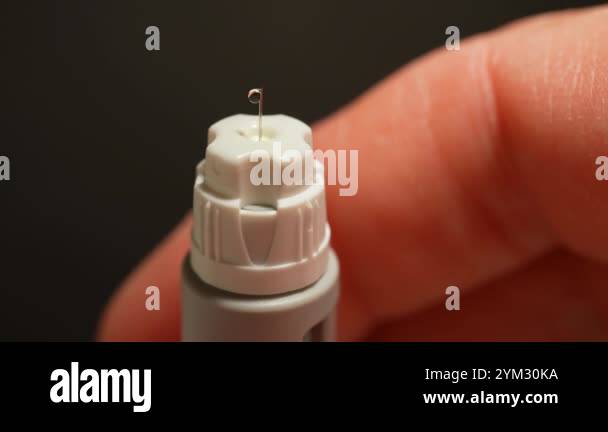 Diabetes management injection pen needle close up. Semaglutide drug ...